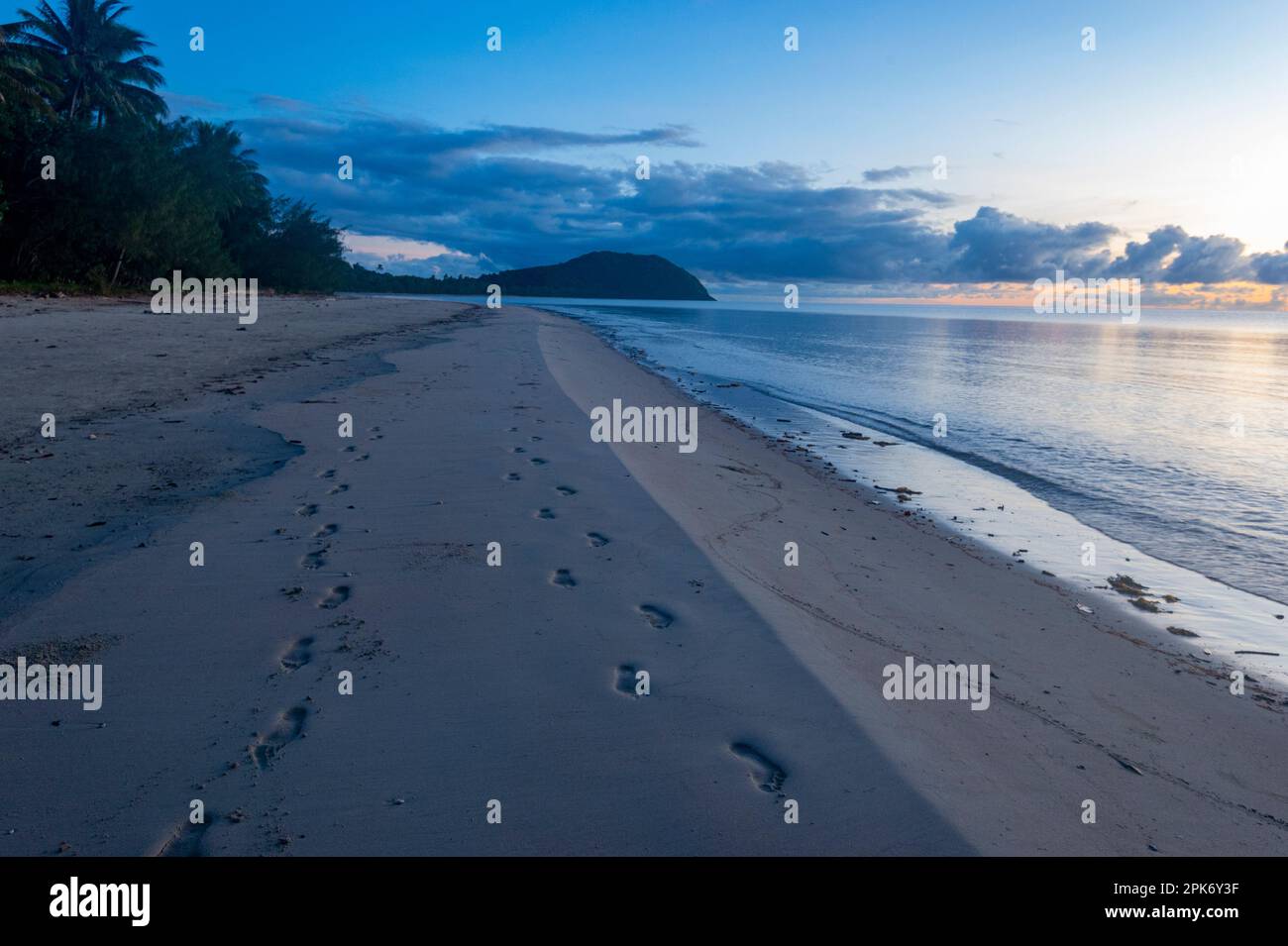 Footprints in the sand at sunrise on deserted Myall Beach, Cape ...