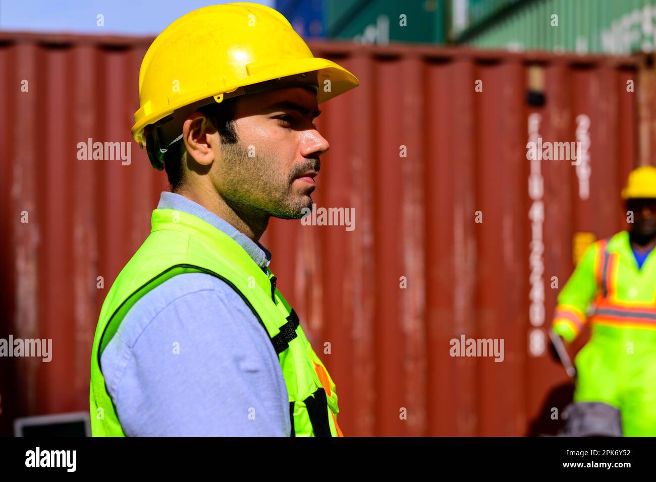 Warehouse engineer worker working at industrial container yard Stock ...