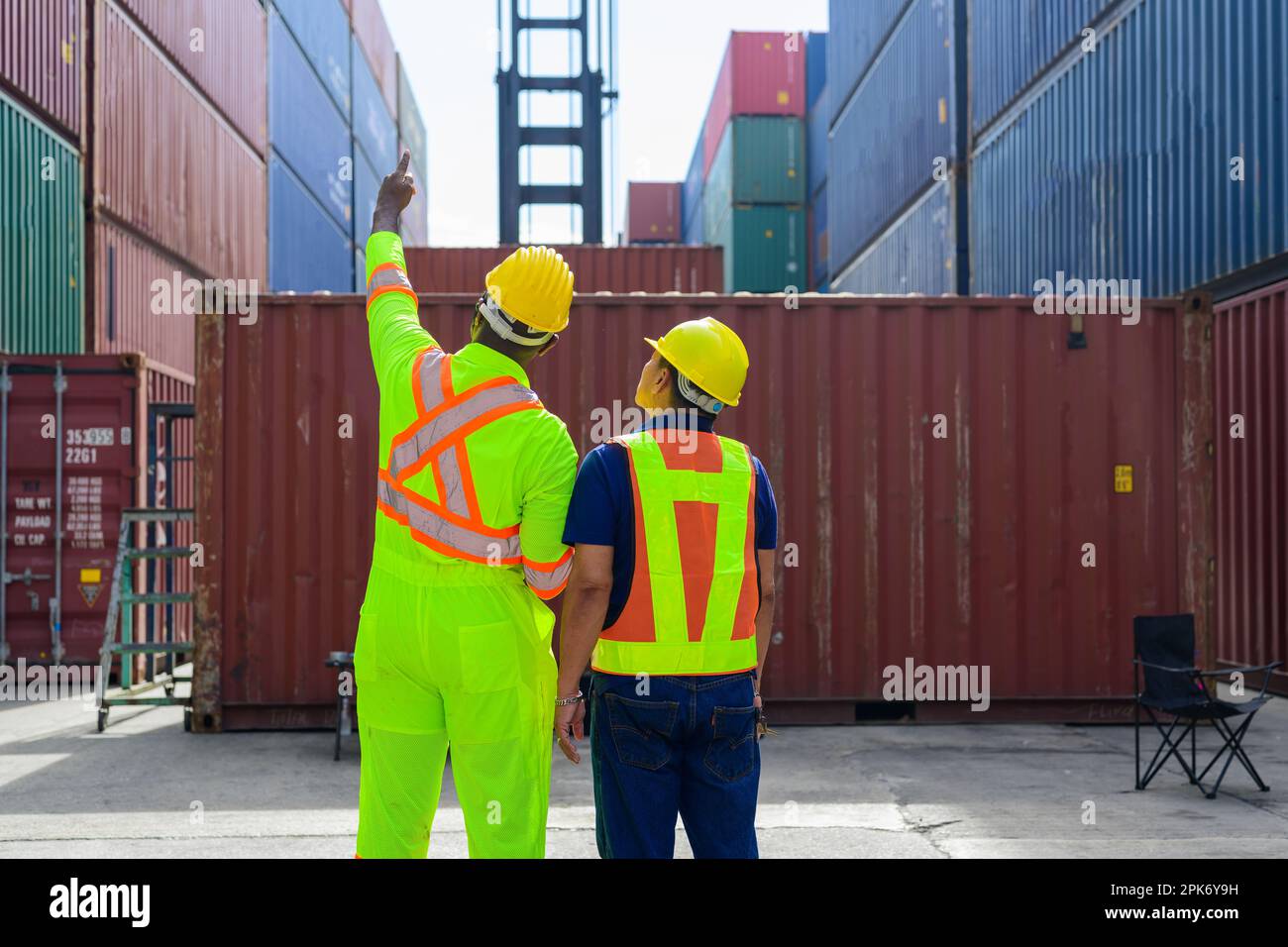 Warehouse engineer worker working at industrial container yard Stock ...