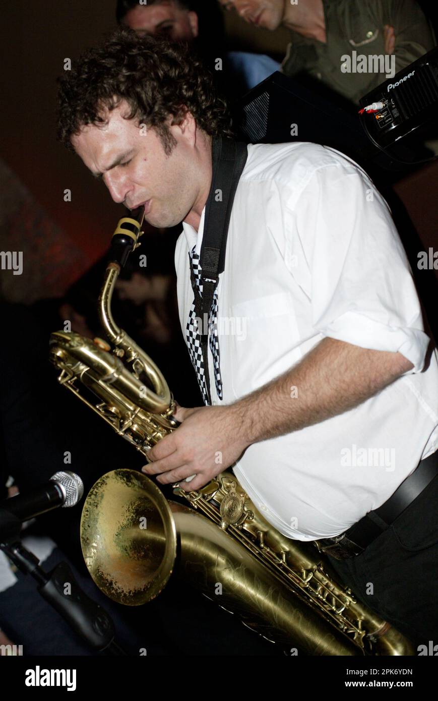 Saxophonist Ian, accompanyist to DJ Lady Tre, at the official media and ...