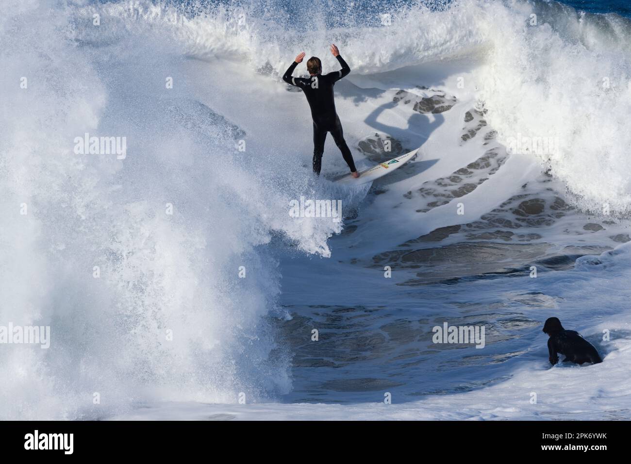 Man surfing on large wave, Newport Beach, California, USA Stock Photo ...