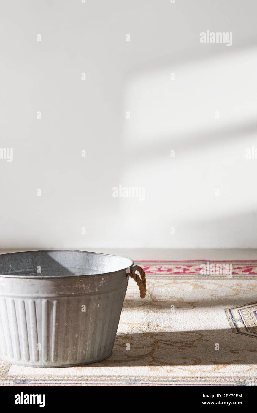 This room has a calm atmosphere with natural light. There are clay pots ...