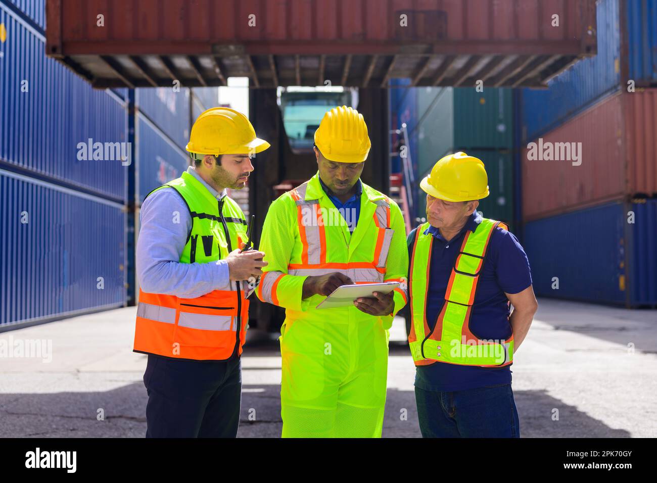 Warehouse engineer worker checking and working at industrial container ...