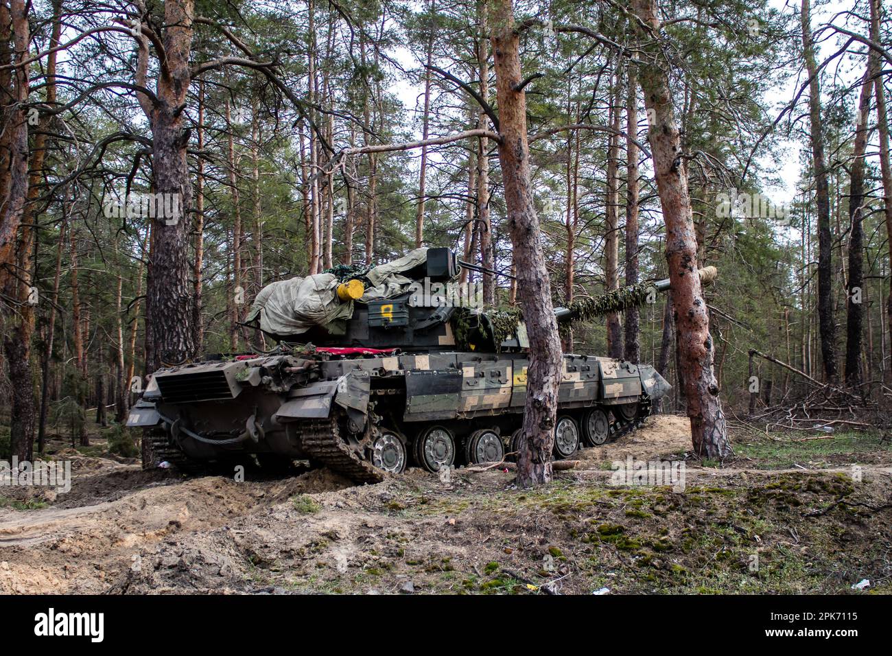 Ukrainian T-72B tank camouflaged in Lyman forest near the front line in ...