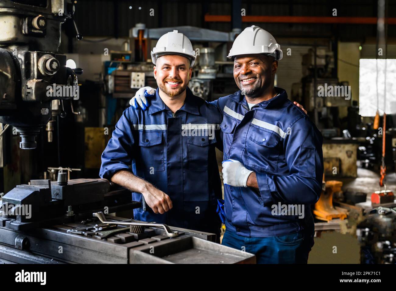 Portrait of professional mechanical engineer team checking and ...