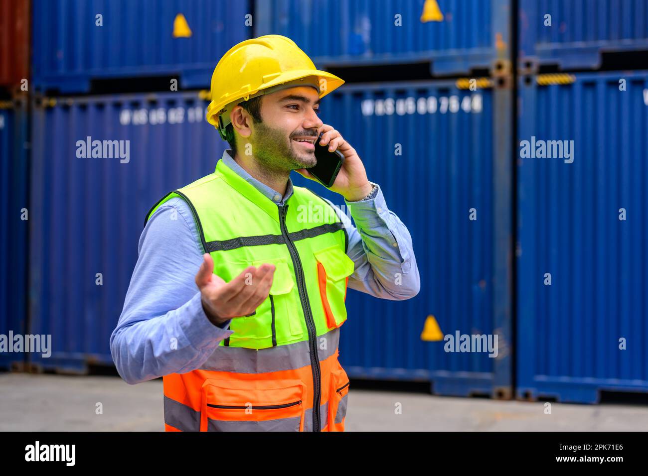 Warehouse engineer worker checking and working at industrial container ...