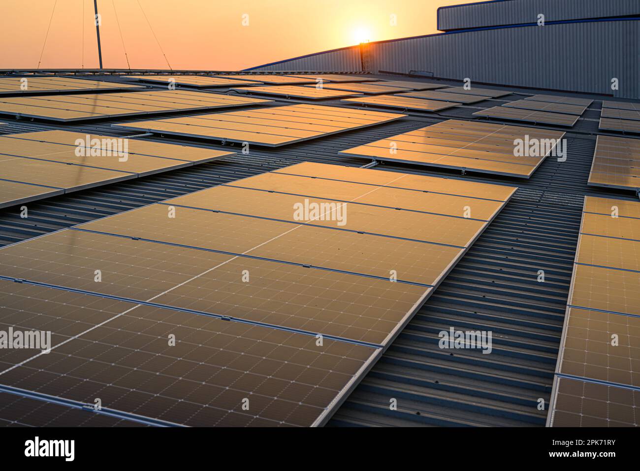 Solar cell farm power plant and solar panels with sunset in evening ...