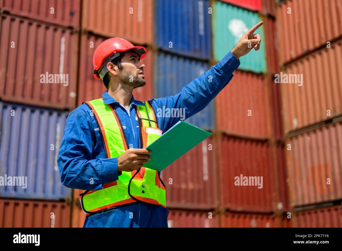 Warehouse engineer worker working at industrial container yard Stock ...