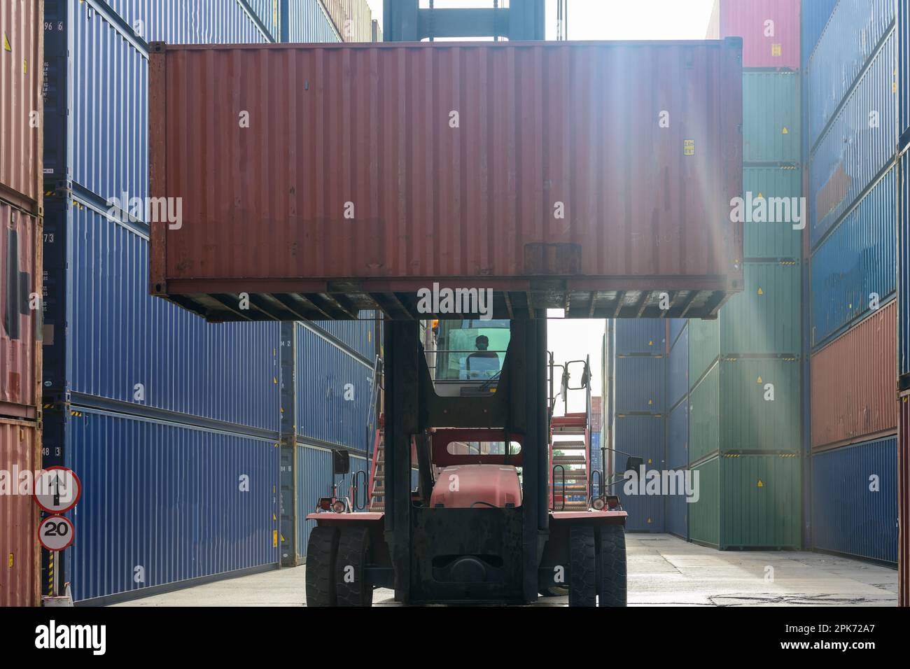 Shipping containers in storage yard Stock Photo - Alamy