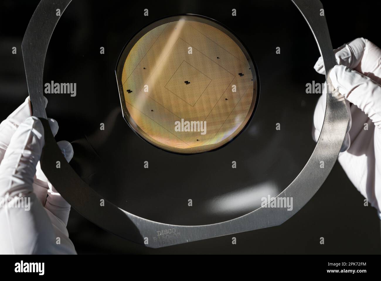 Ulm, Germany. 04th Apr, 2023. An employee of Trumpf Photonic Components ...