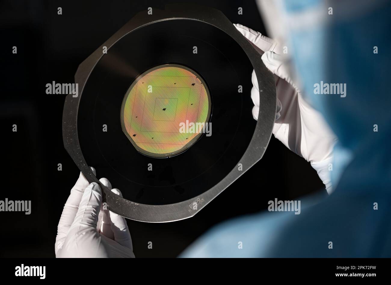 Ulm, Germany. 04th Apr, 2023. An employee of Trumpf Photonic Components ...