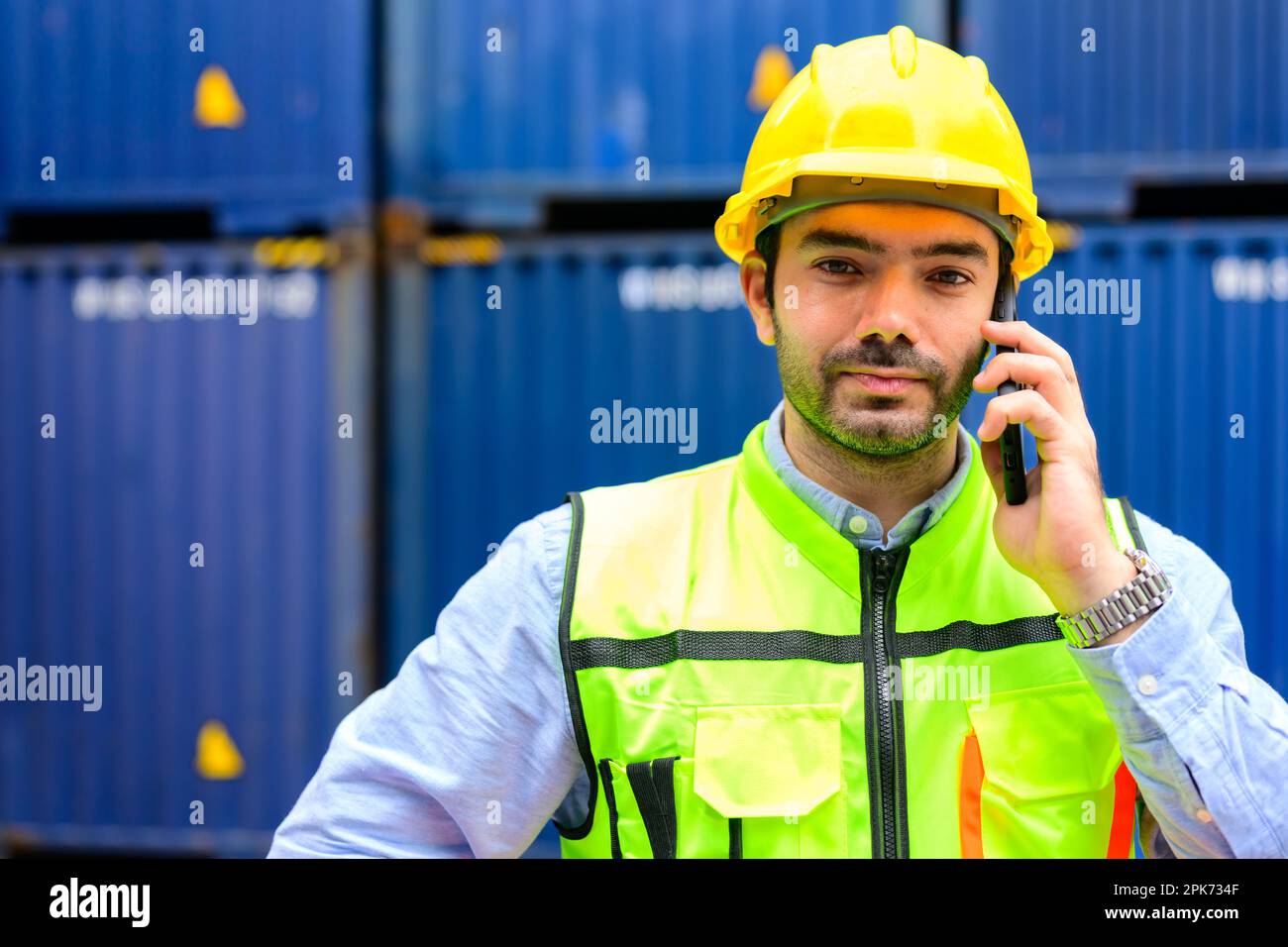 Warehouse engineer worker checking and working at industrial container ...