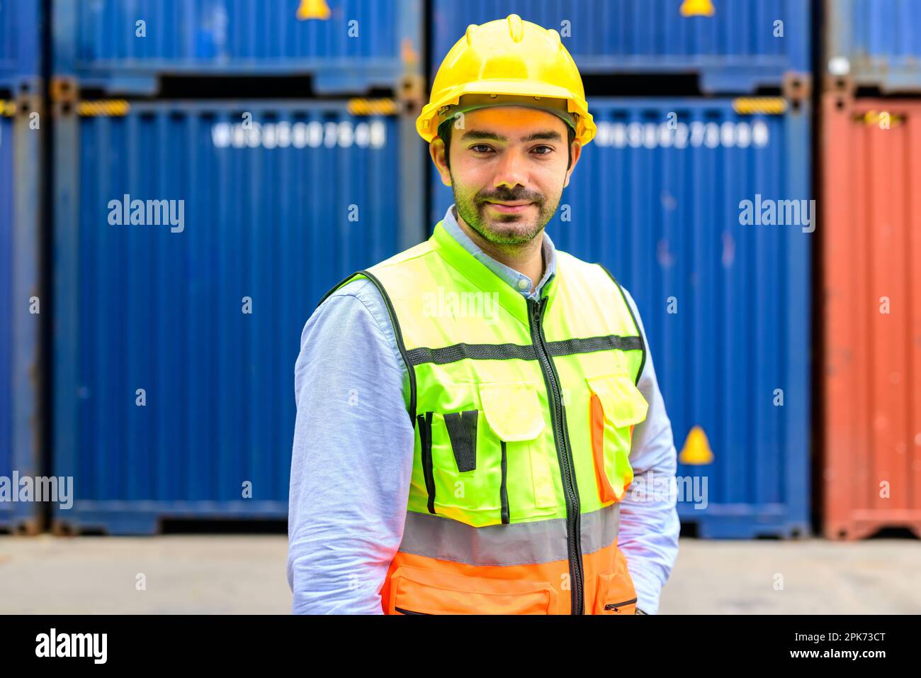 Warehouse engineer worker checking and working at industrial container ...