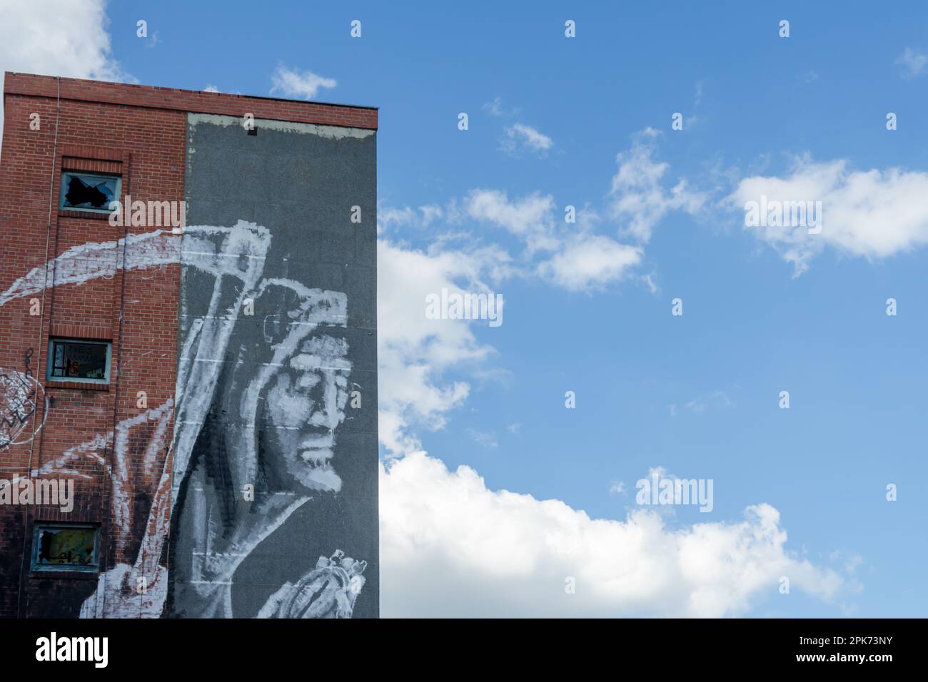The grim reaper as graffity on a house wall of a lost place in berlin ...