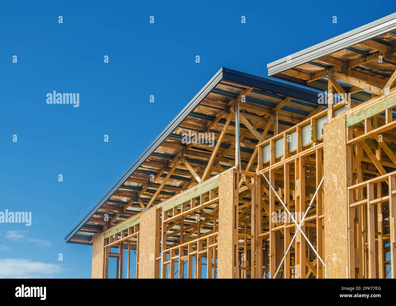 Roof and wall of a partially built house under construction Stock Photo ...
