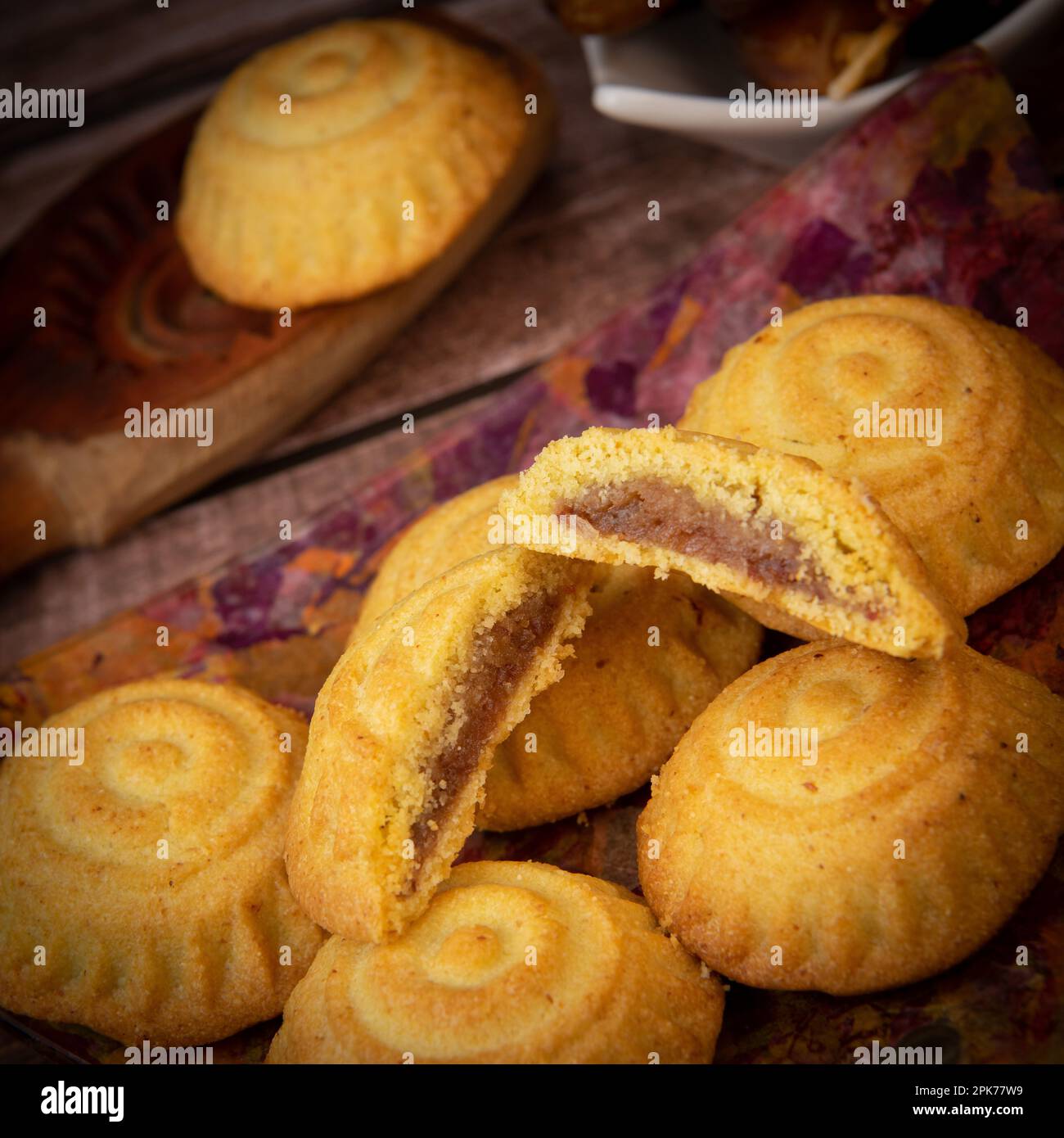Traditional eid maamoul or mamoul cookies with dates, nuts, and jam ...