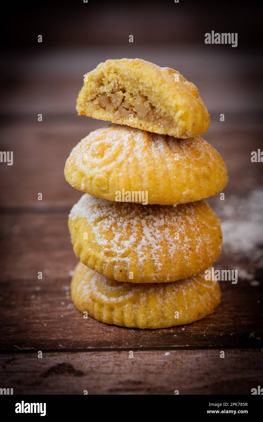 Traditional eid maamoul or mamoul cookies with dates, nuts, and jam ...