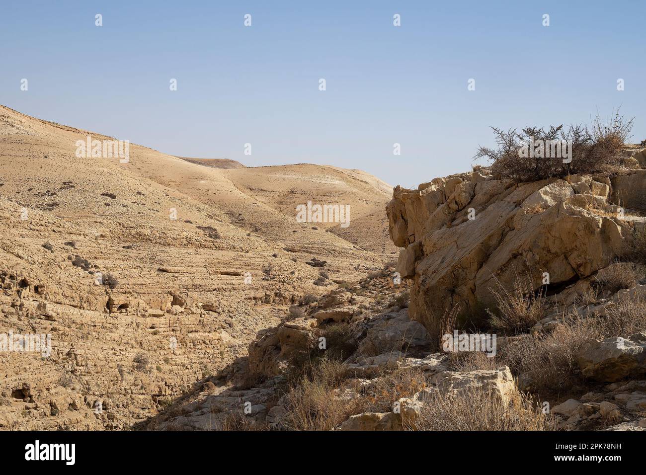A panoramic landscape of the dry Judea desert, Israel, at the end of ...