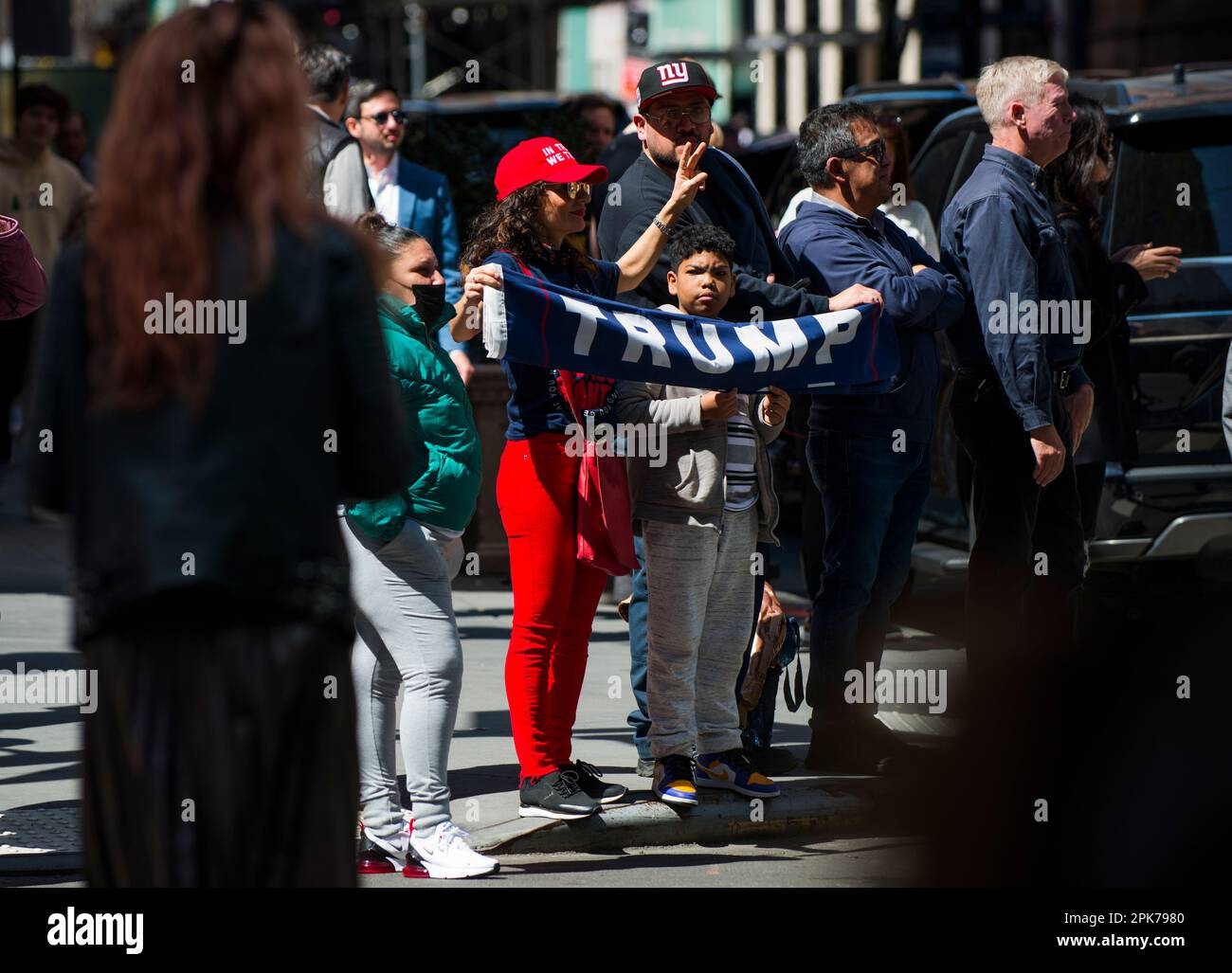 Pro President Trump demonstrators hold Trump sign while standing on ...
