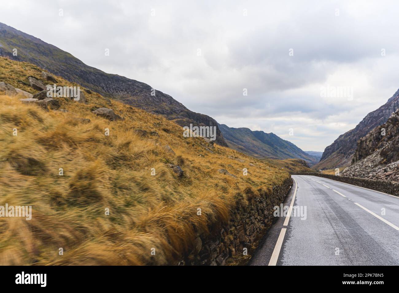 Mountain road through Snowdonia national park in North Wales. High ...