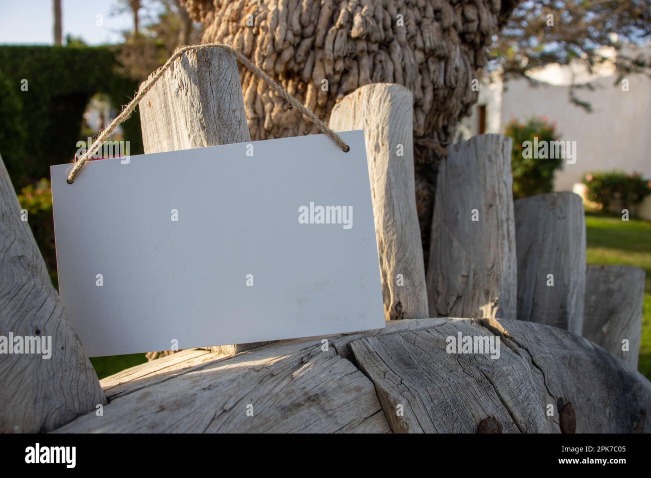 ruatic drift wood and white hanging picture sign with empty free space ...