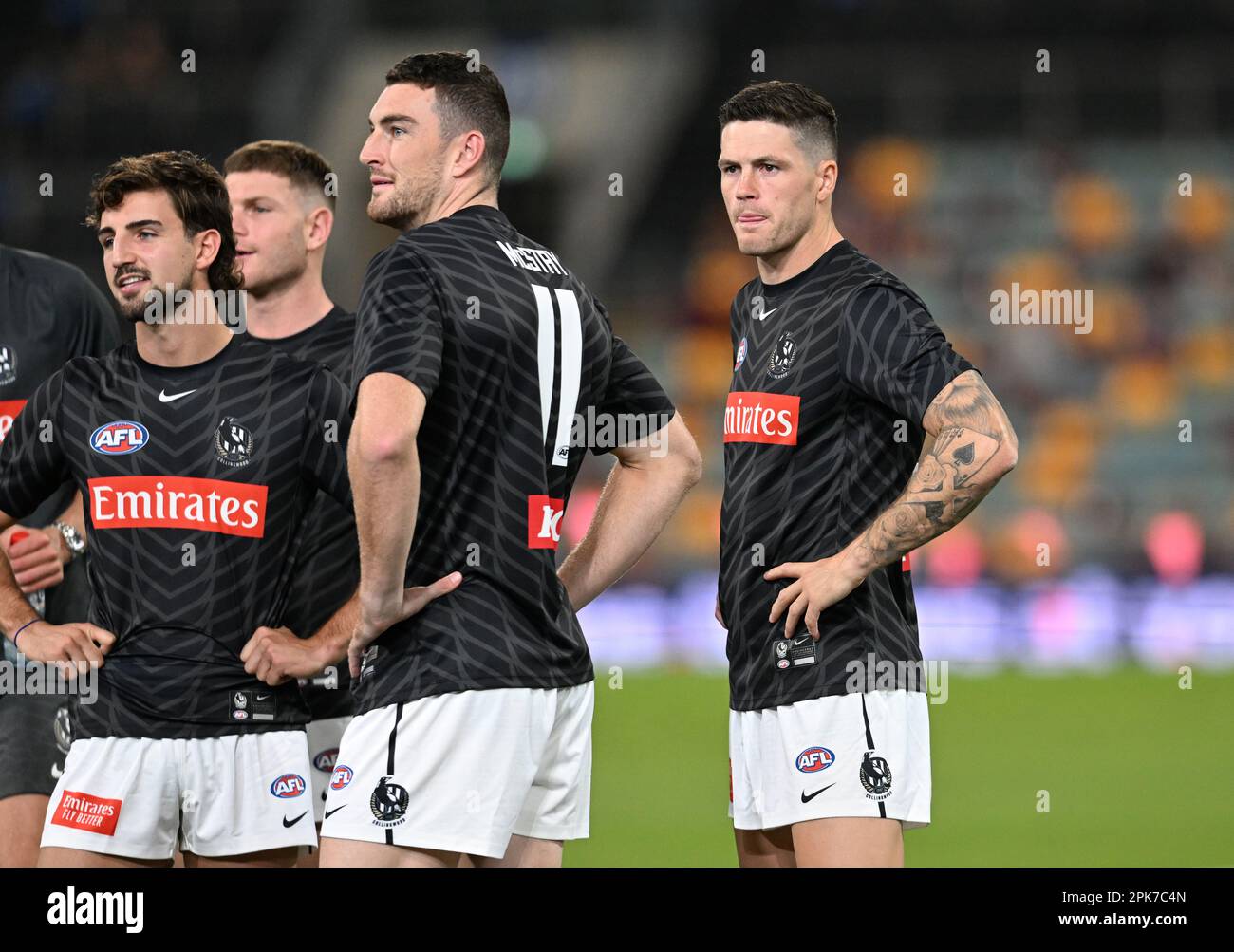 Jack Crisp (right) of the Magpies is seen with team mates during the ...