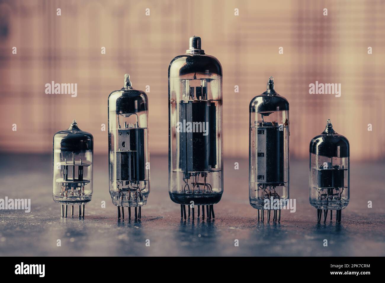 Old diode lamps of different sizes on a table, close up. Several ...