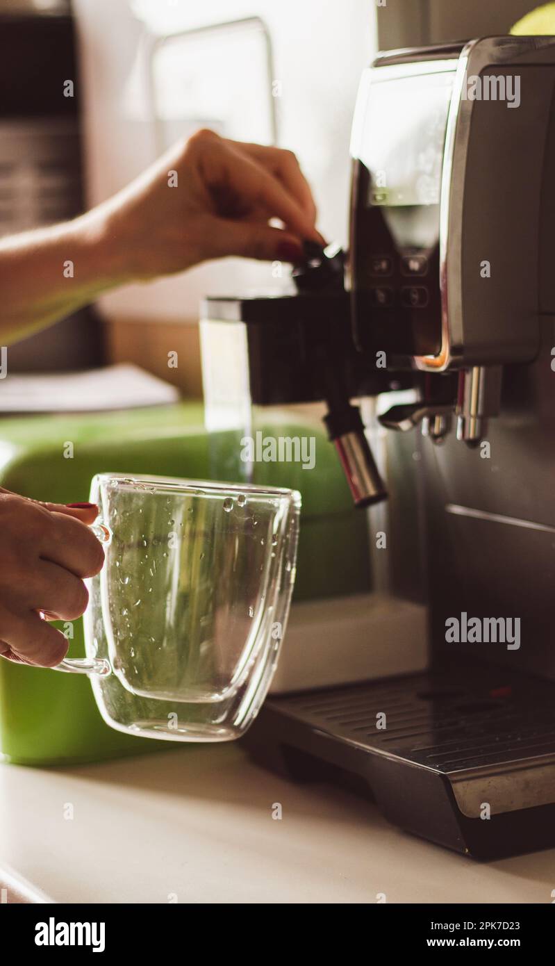 Hand pouring machine hi-res stock photography and images - Alamy