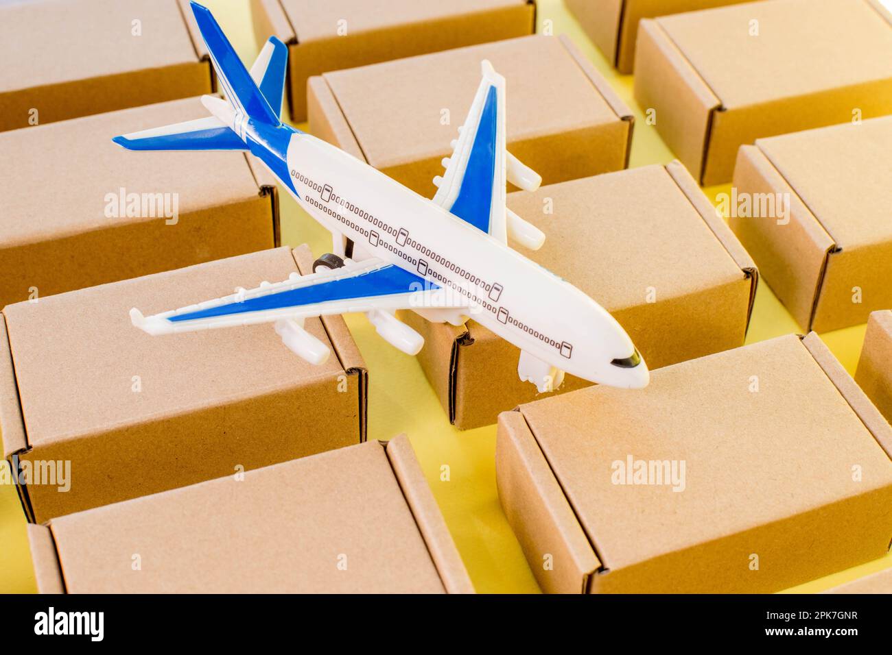 Airplane and kraft cardboard boxes. Fast delivery of goods and products ...