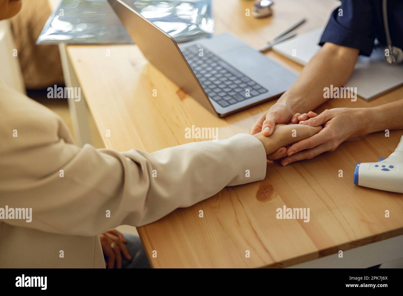 Close up of doctor conducts a preventive examination of patient and ...