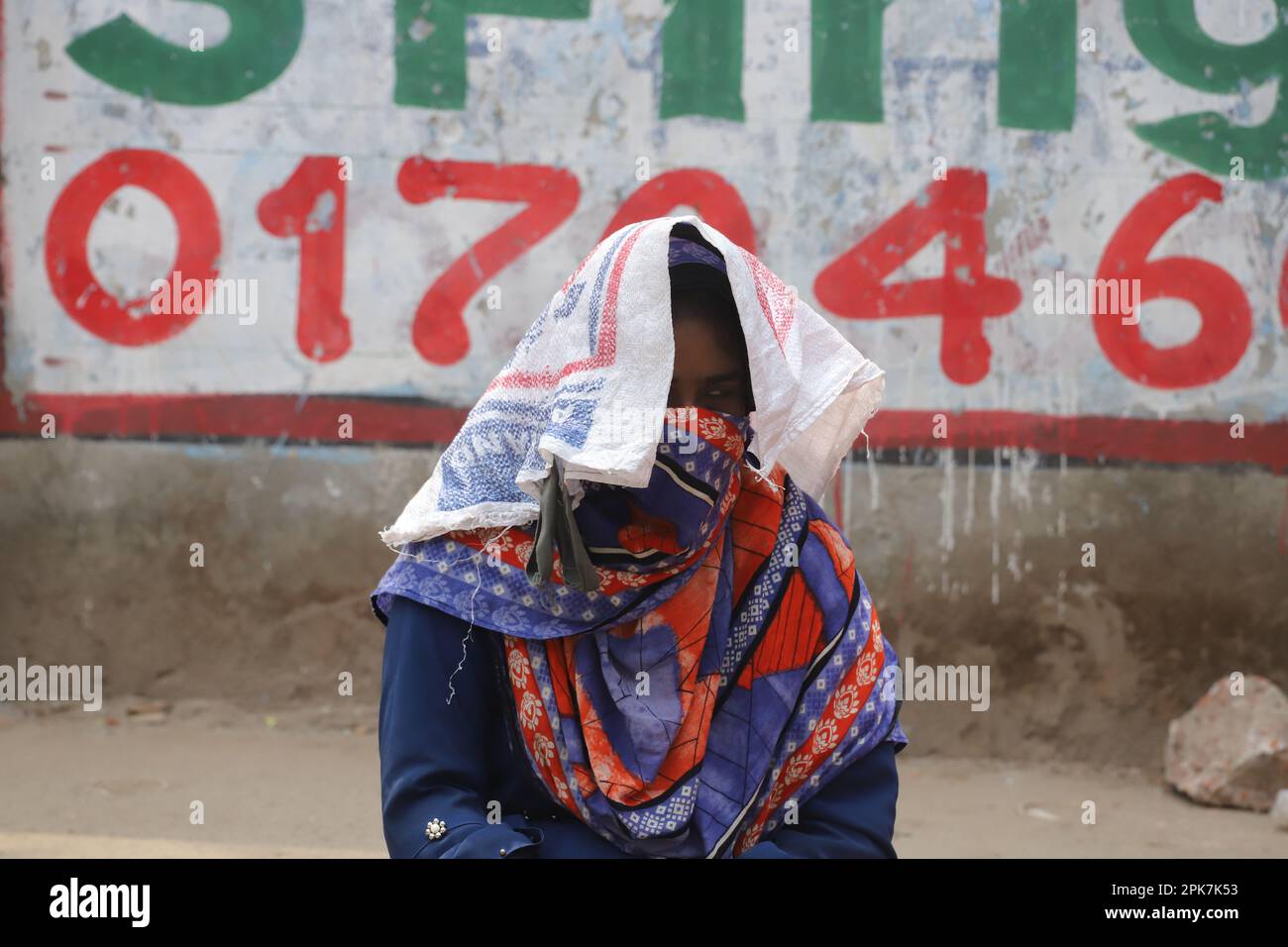 People from low-income groups wait in queues in front of the food ...