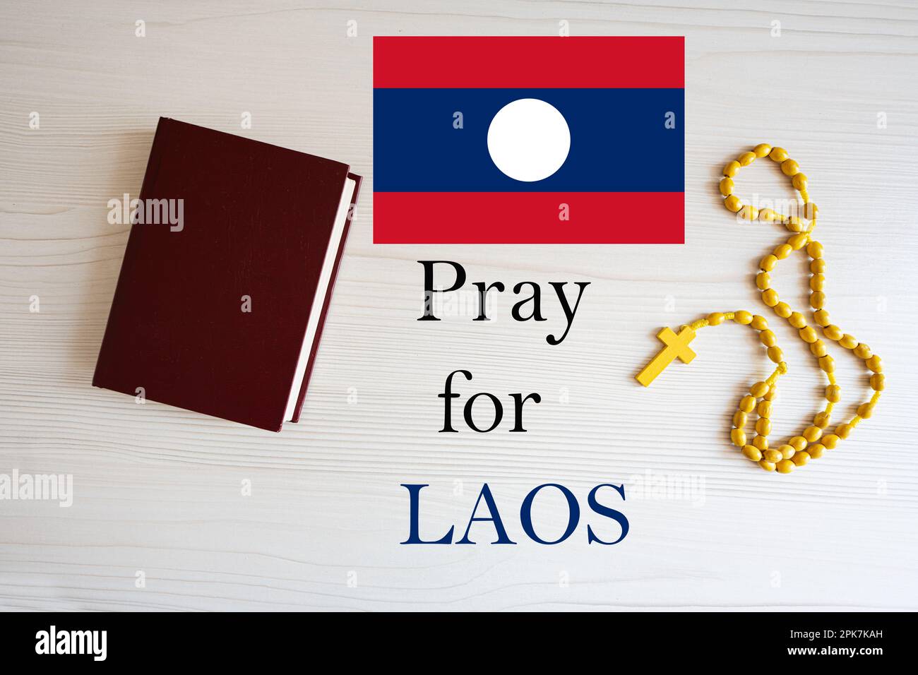 Pray for Laos. Rosary and Holy Bible background Stock Photo - Alamy