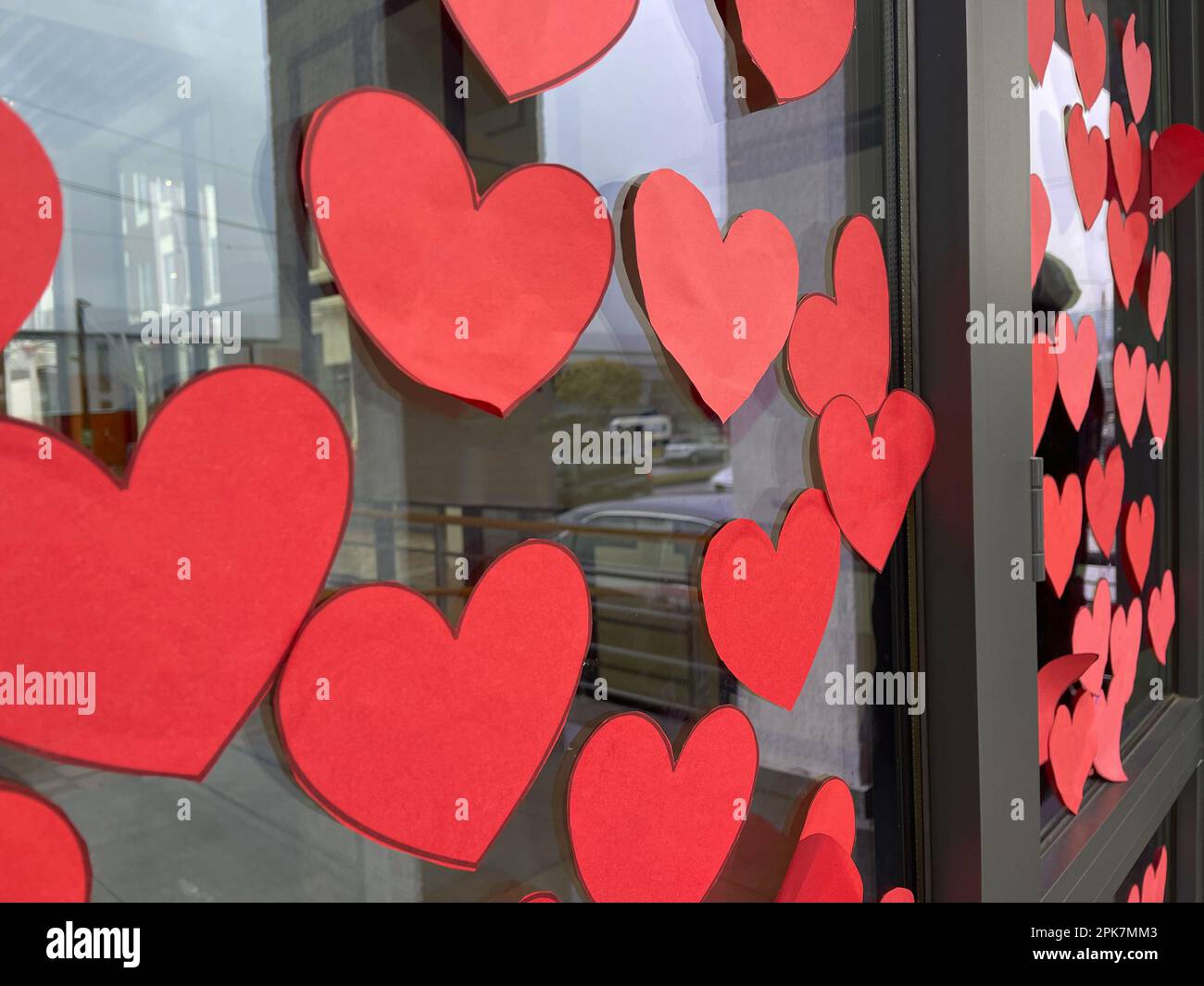 Red heart banner boards on window outdoor. Empty hearts with copy space ...