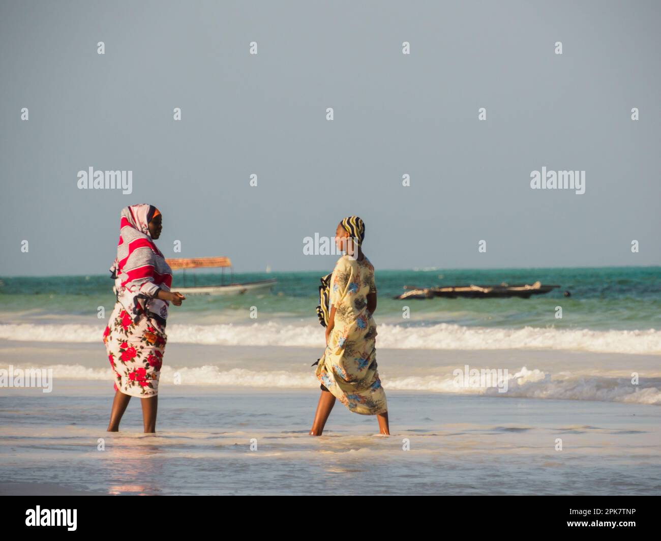 Matemwe, Zanzibar - Jan, 2021: Women in colorful clothes and ...