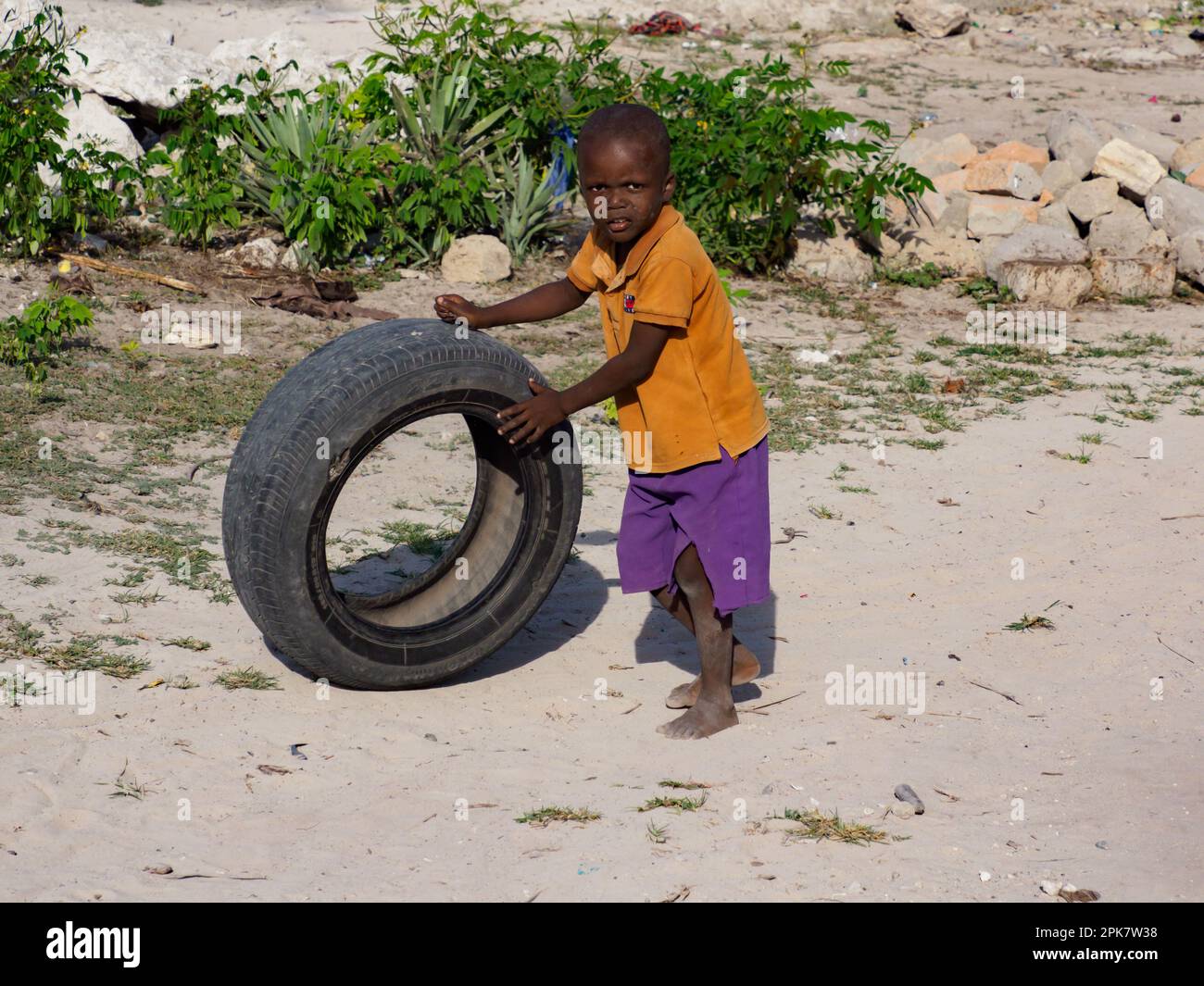Matemwe, Zanzibar, Tanzania - January 2021: African child playing with ...