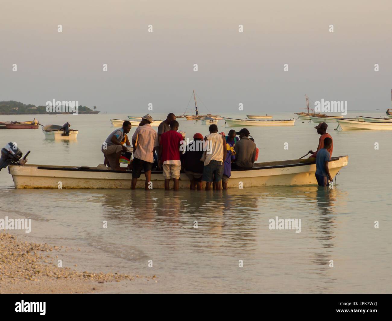 Zanzibar, Tanzania - Jan, 2021: Fishermen collecting fish from wooden ...