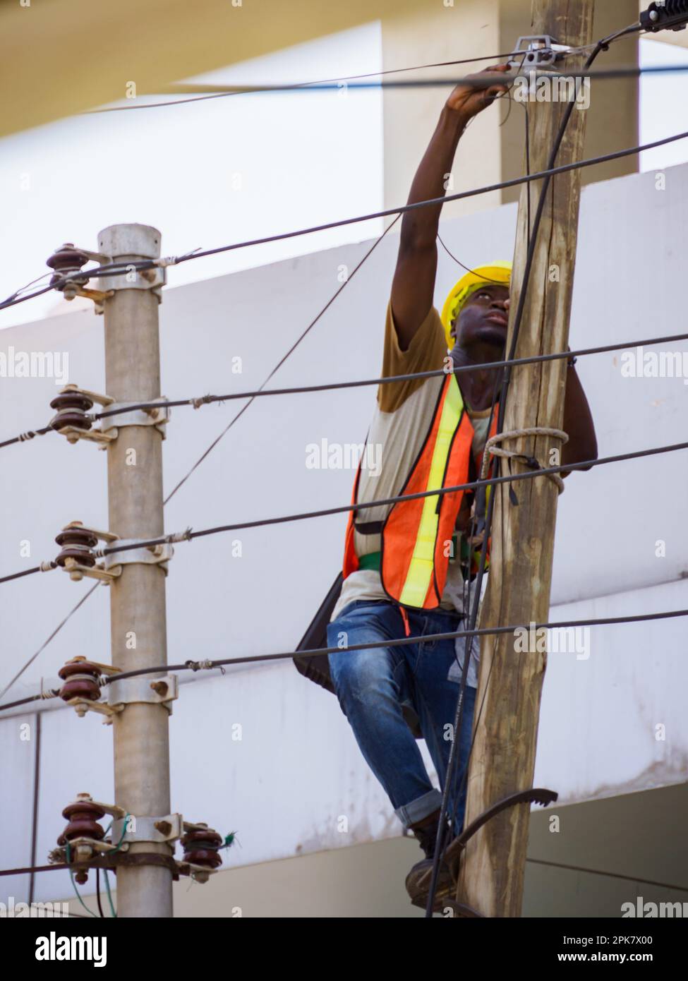 Dar es Salaam, Tanzania - February 2021: African man mending ...