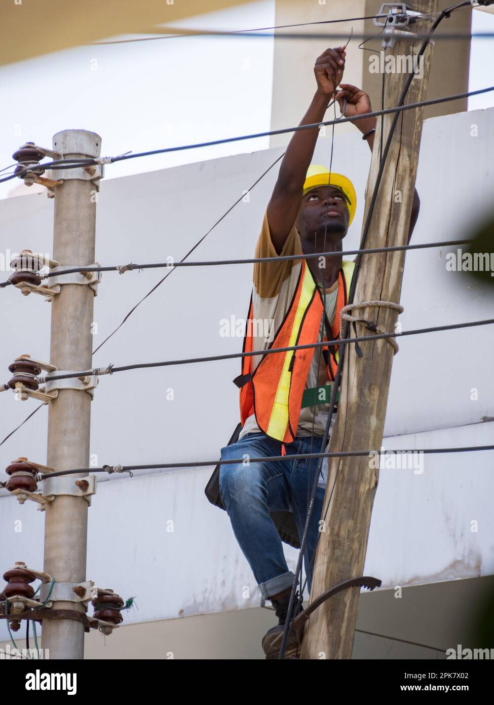 Dar es Salaam, Tanzania - February 2021: African man mending ...