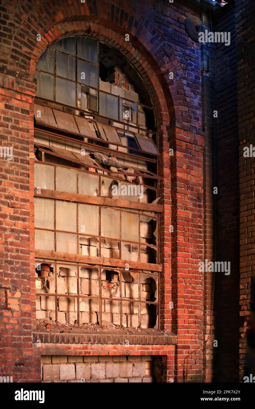 Big, broken and walled window in an old factory building Stock Photo ...
