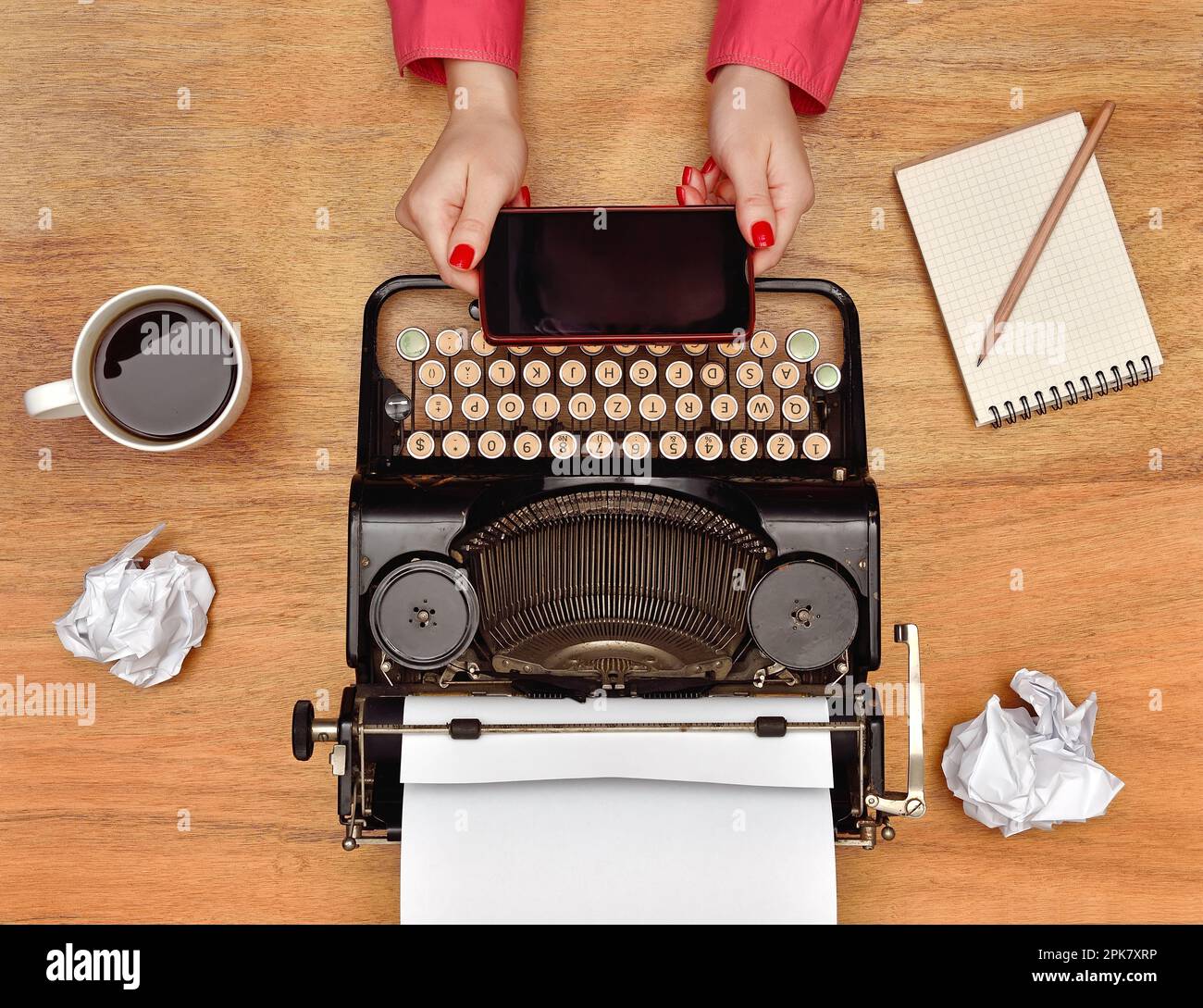 female author are holding the phone in hand Stock Photo - Alamy