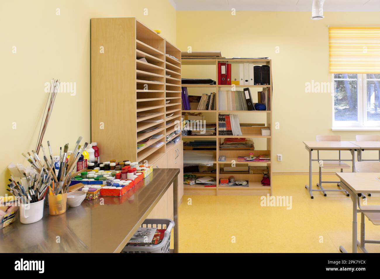 A school art room, classroom with shelves and equipment, paints and ...