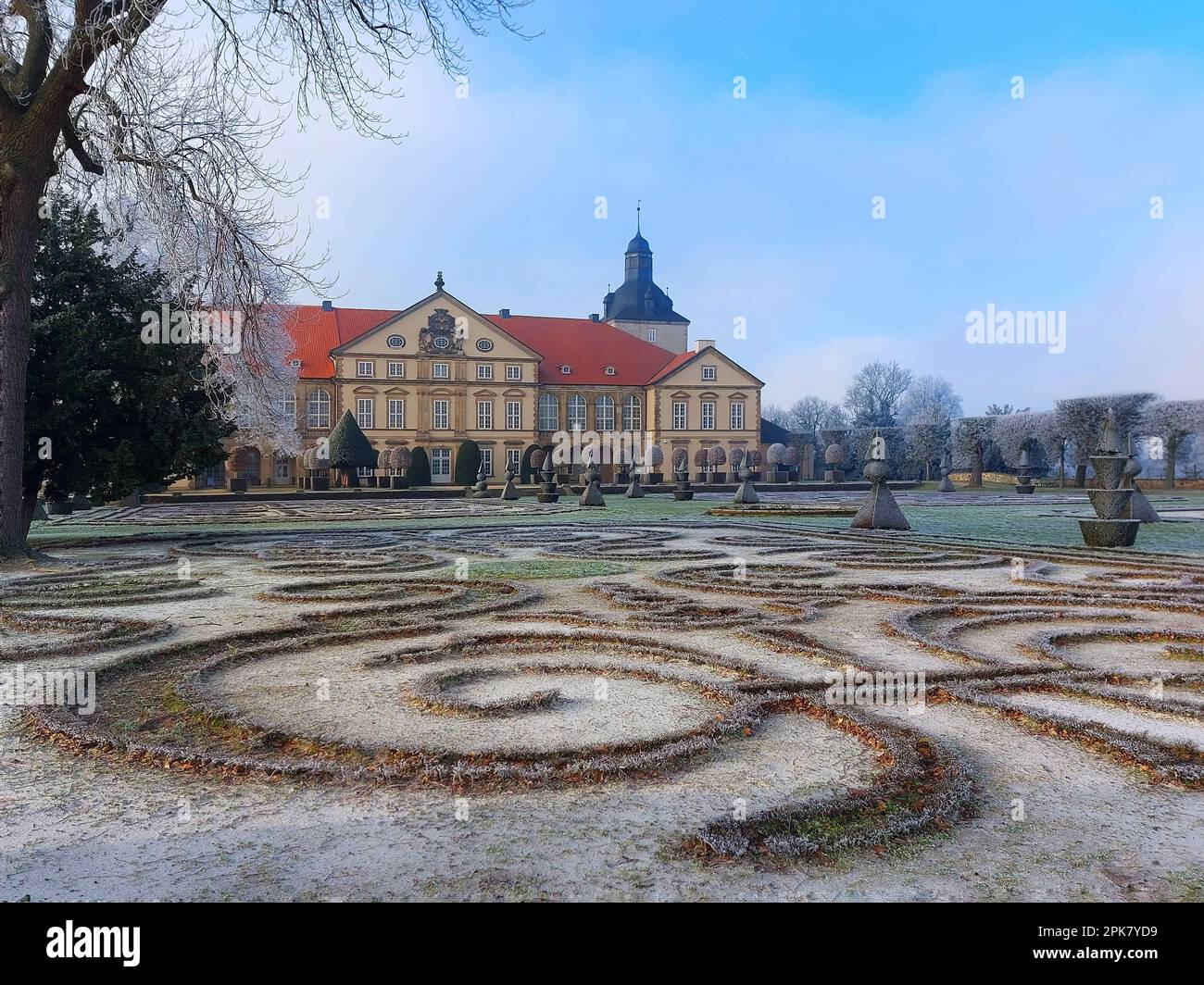 Winterly Hundisburg Castle with geometric palace gardens in Germany ...