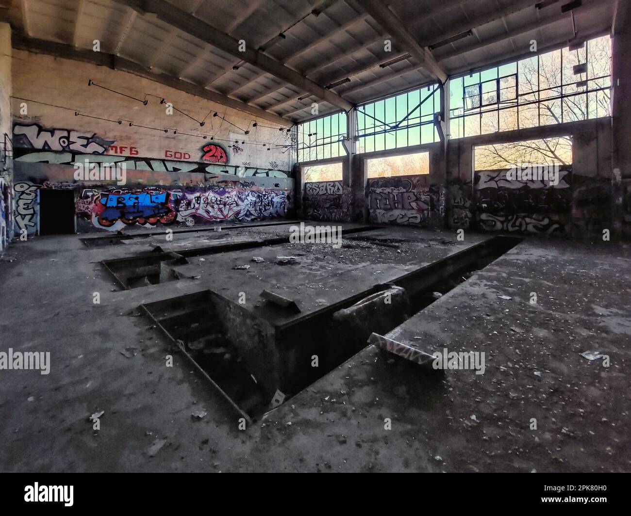 Abandoned interior of truck repair shop in Germany Stock Photo - Alamy