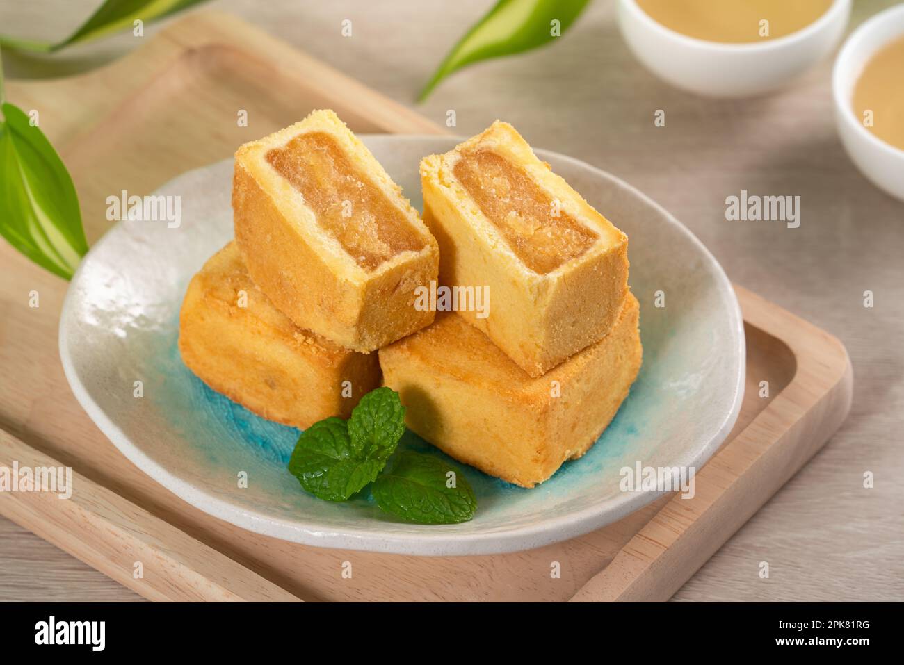 Delicious Taiwanese pineapple cake pastry dessert in a plate on wooden ...