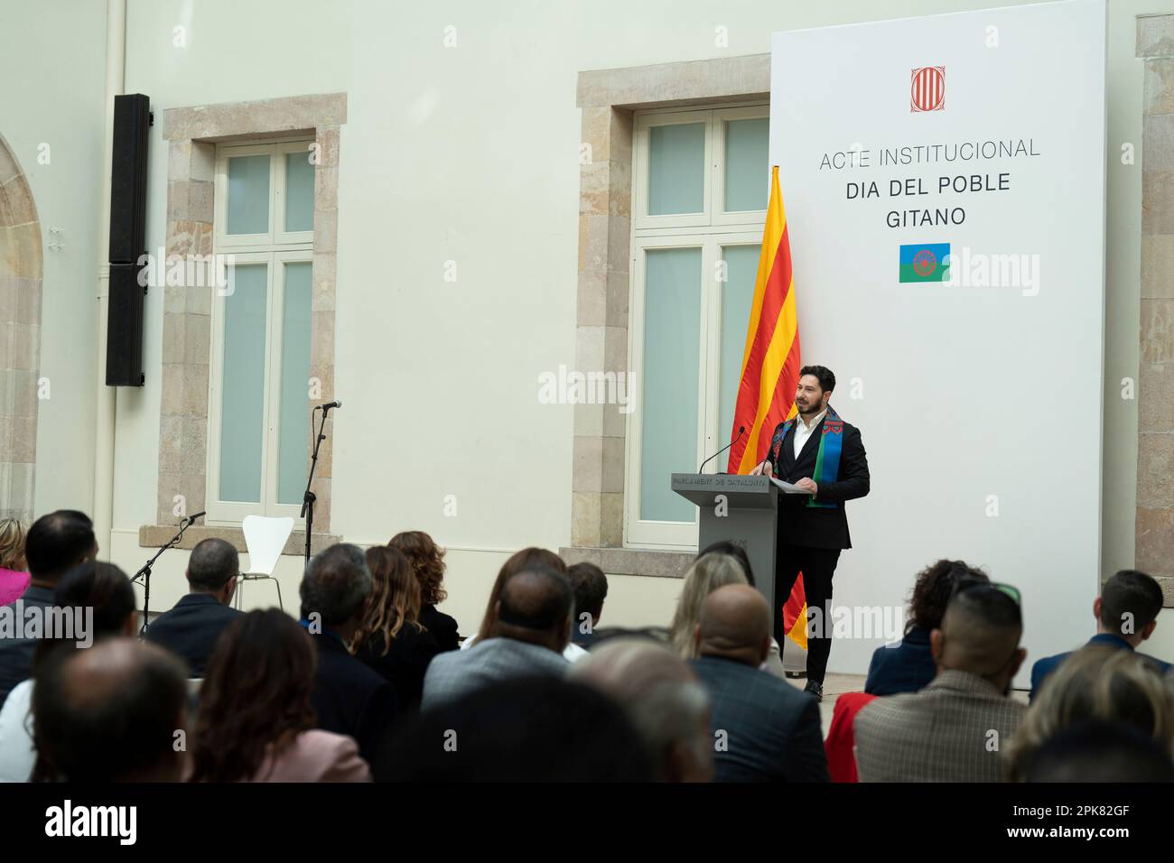 Writer Perseus Cizmich gives a speech on the Romani language during the ...