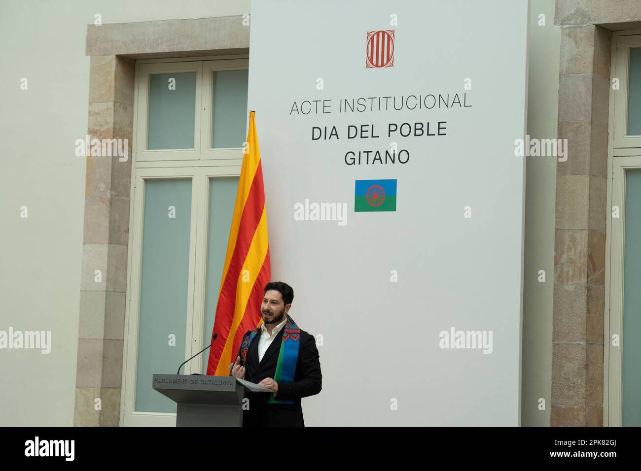 Writer Perseus Cizmich gives a speech on the Romani language during the ...