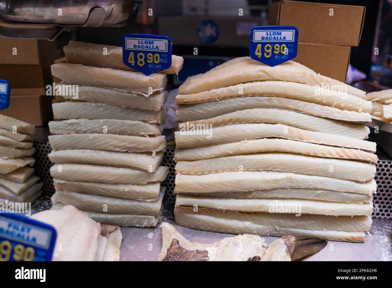 Strips of salted Bacalla fish filet cod in a street market in Spain ...