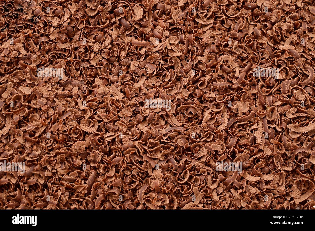 Chocolate shaving texture background top view Stock Photo - Alamy