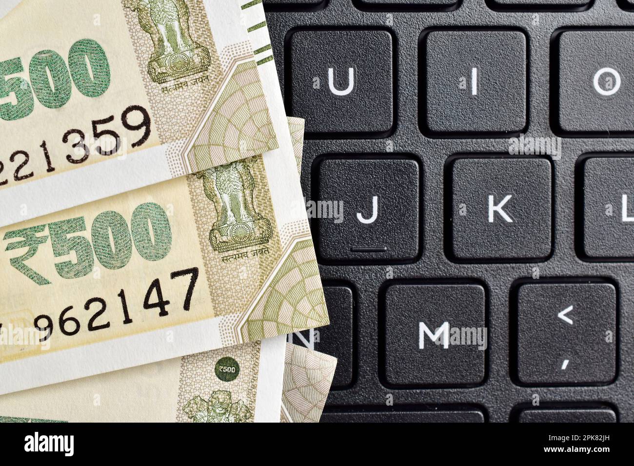 Closeup of indian currency note with keyboard, money with keyboard ...