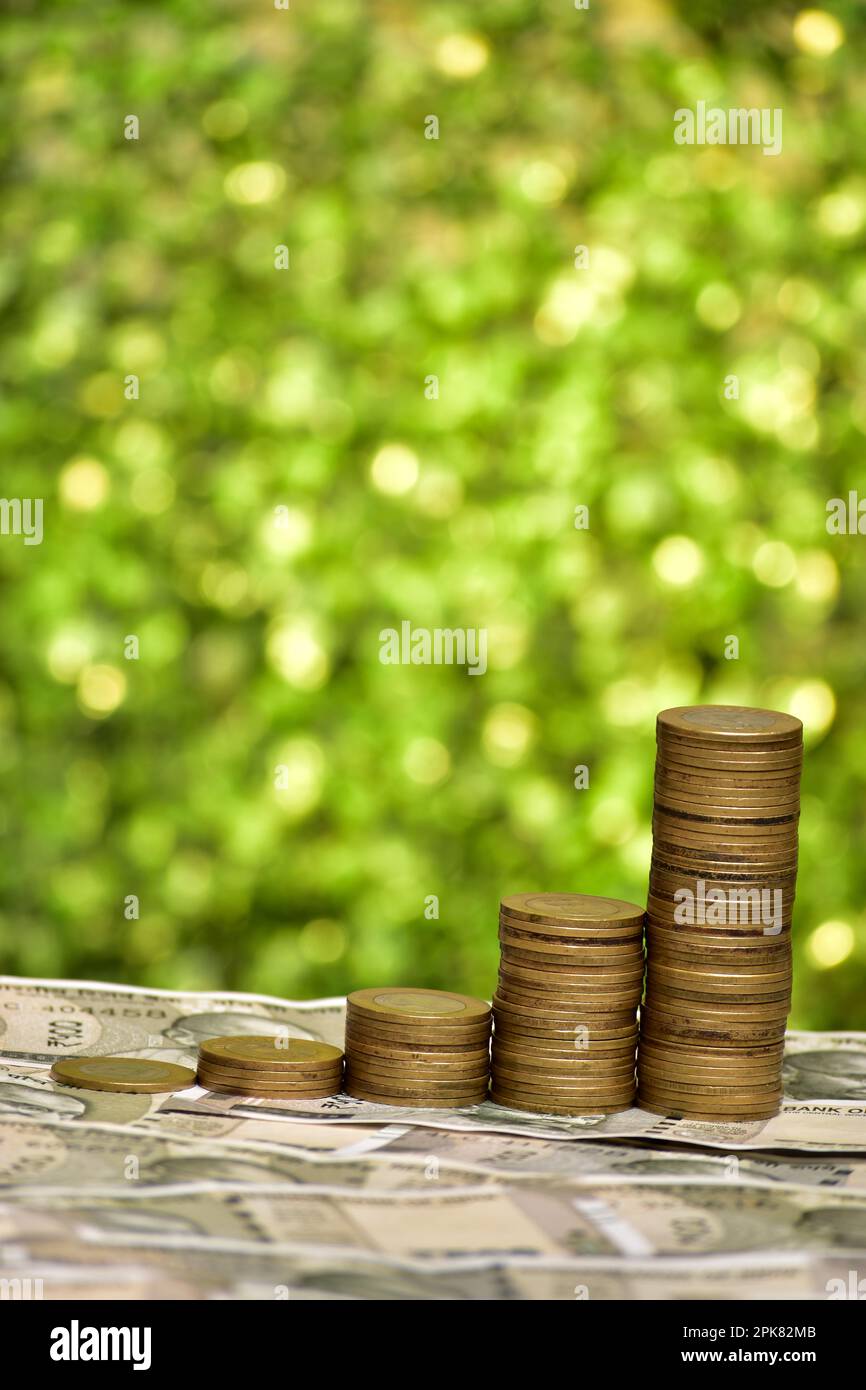 Indian currency coin stack with note Stock Photo - Alamy